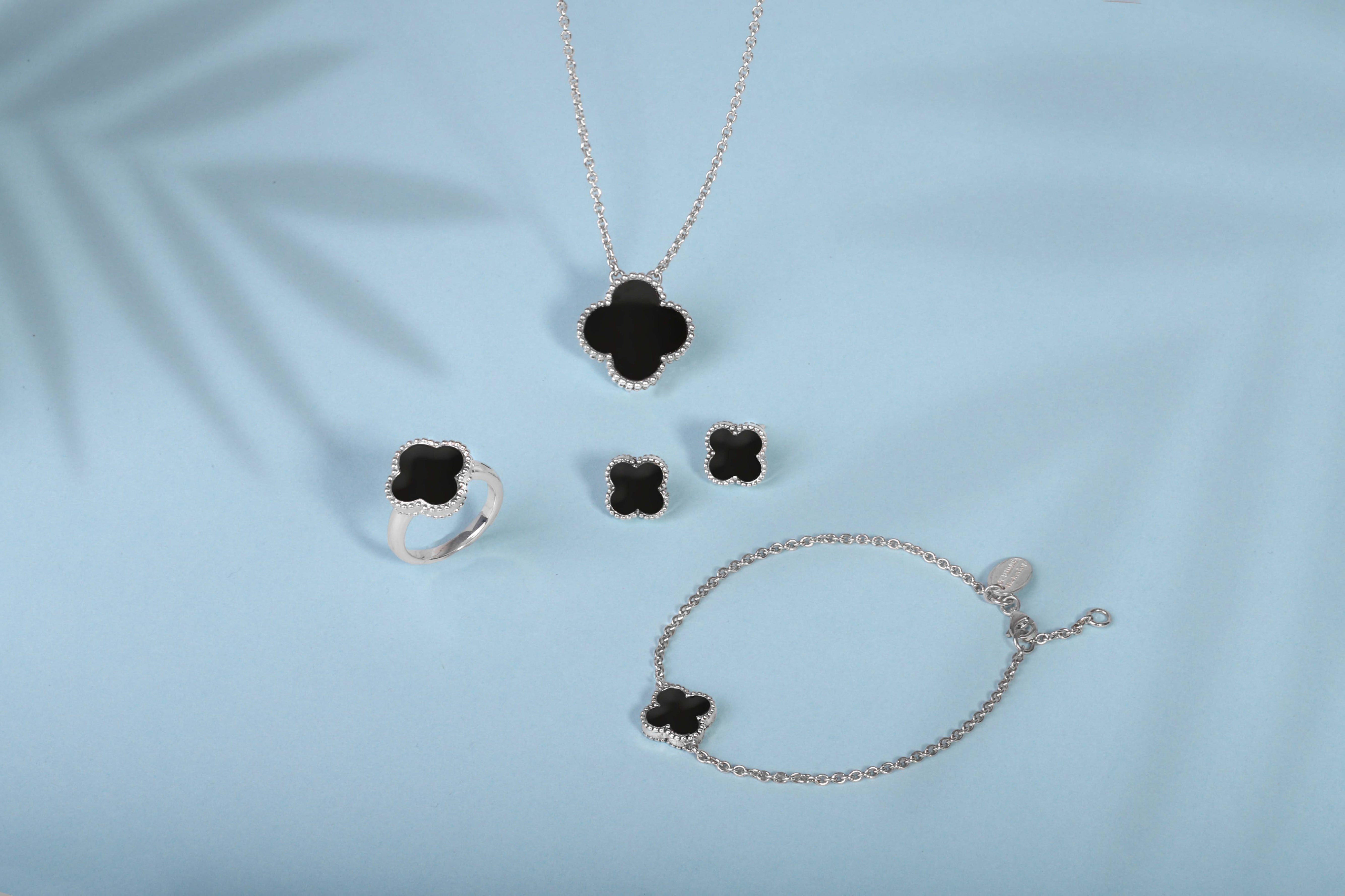 9ct White Gold Whitby Jet Bloom Four Leaf Clover Ball Edge Stud ...